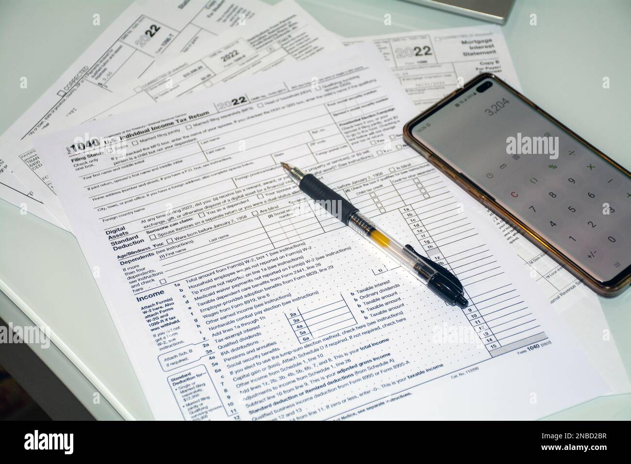 US Tax form 1040 tax return filing for 2022 Stock Photo - Alamy