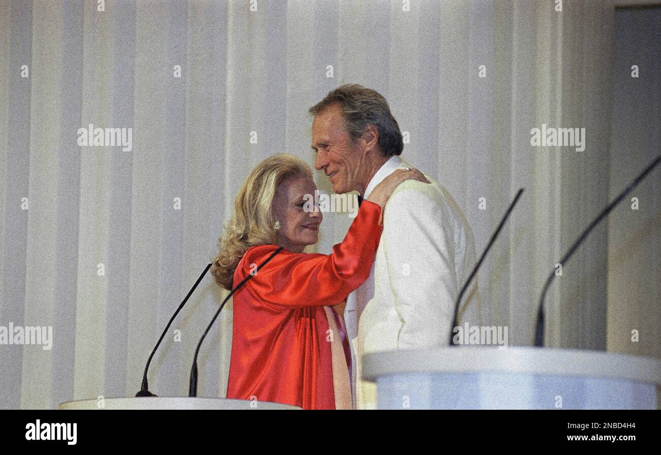 French actress Jeanne Moreau embraces American actor Clint Eastwood ...