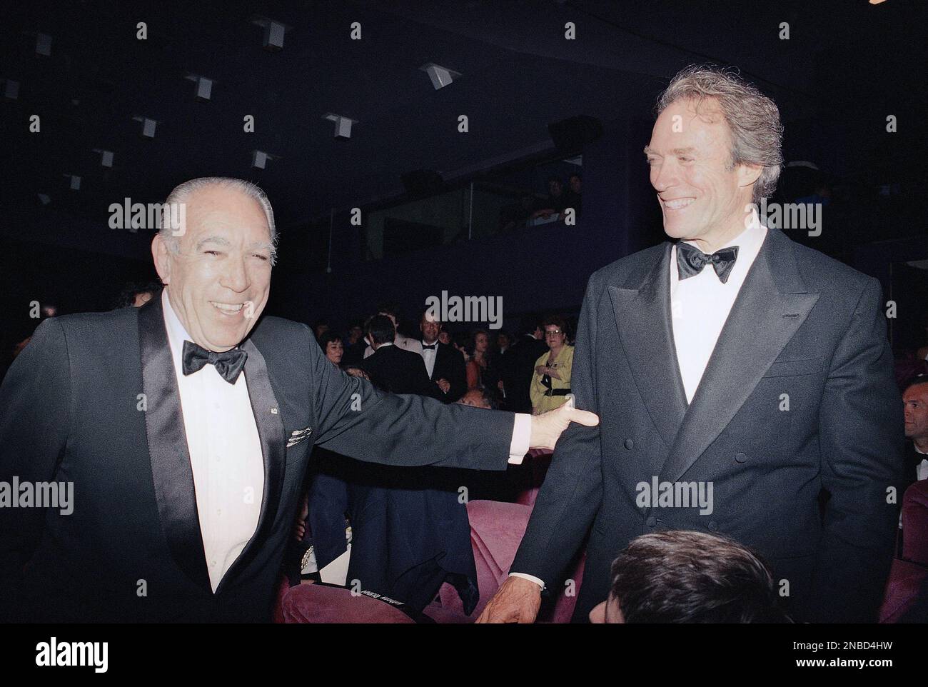 U.S. actor Anthony Quinn greets actor and director Clint Eastwood at ...
