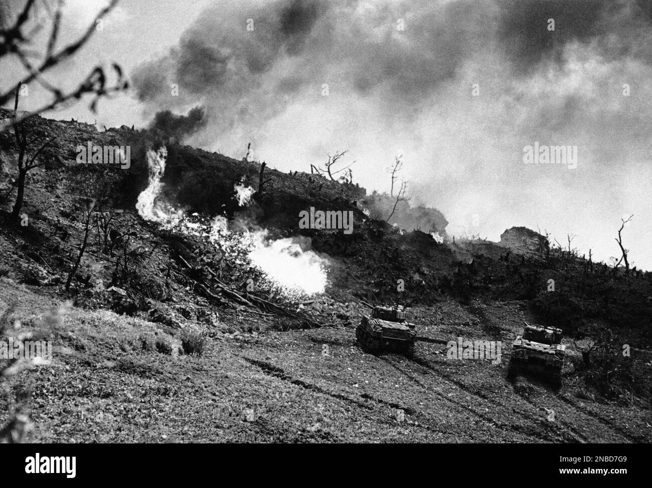 Flame throwing tank is put in action against Japanese positions on the ...