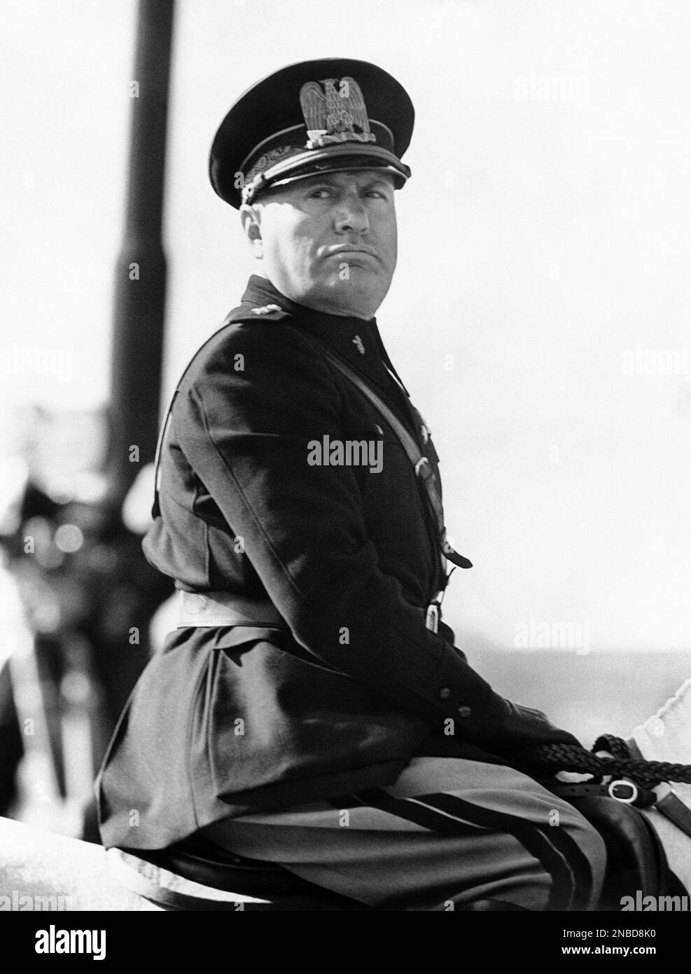 Benito Mussolini, in the newly introduced Fascist uniform, on his horse ...