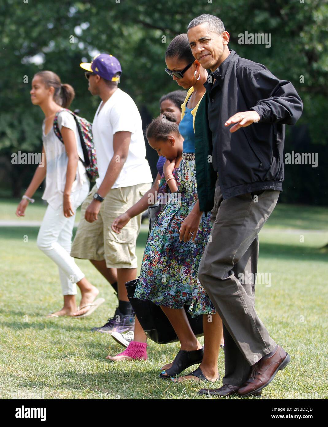 President Barack Obama, right, with, from left, his daughter Malia ...