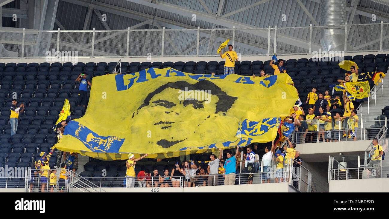 Club America fans cheer in the upper sections of Cowboys Stadium in the ...
