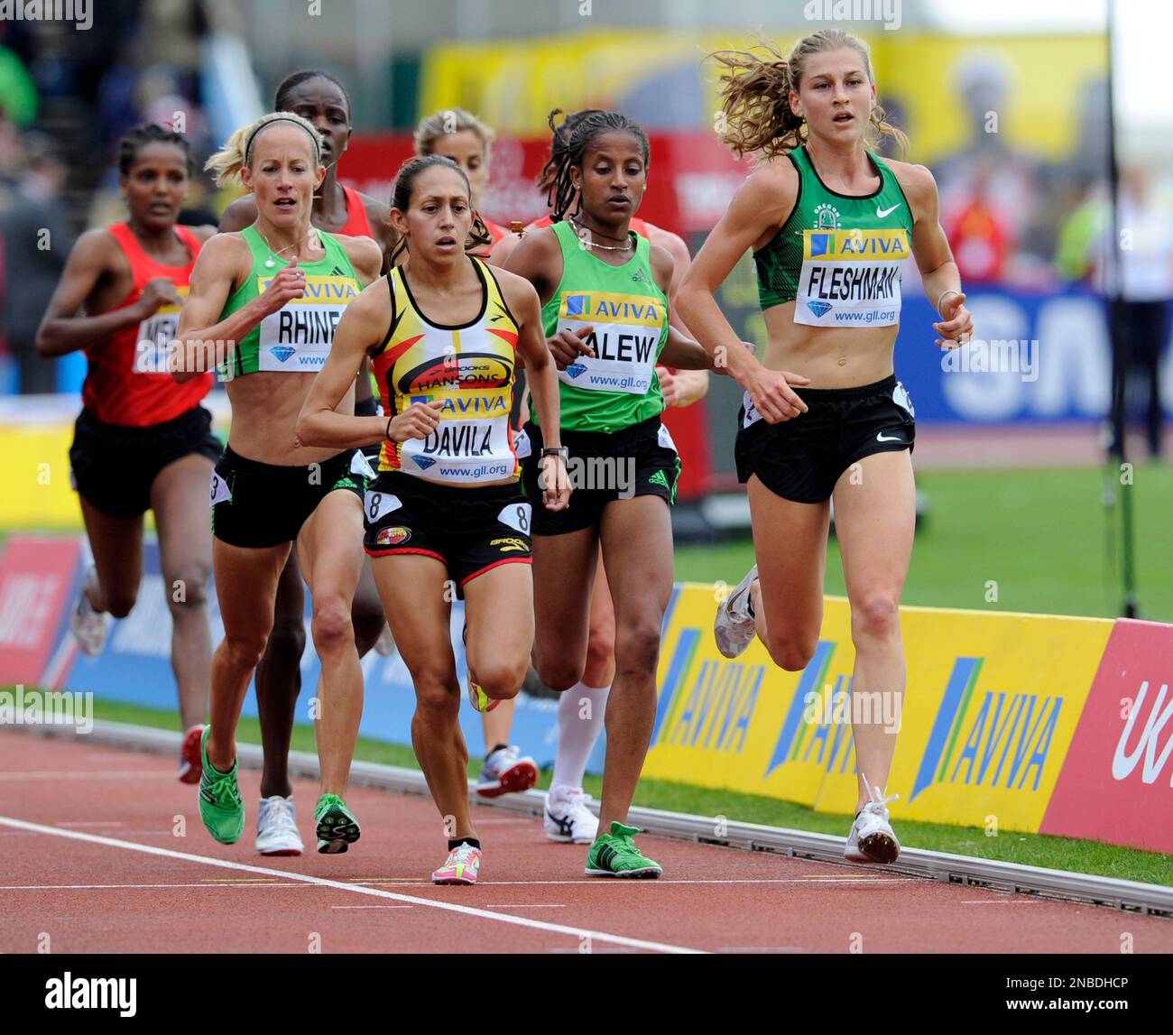US Lauren Fleshman, right, leads in the women's 5000m race during the ...