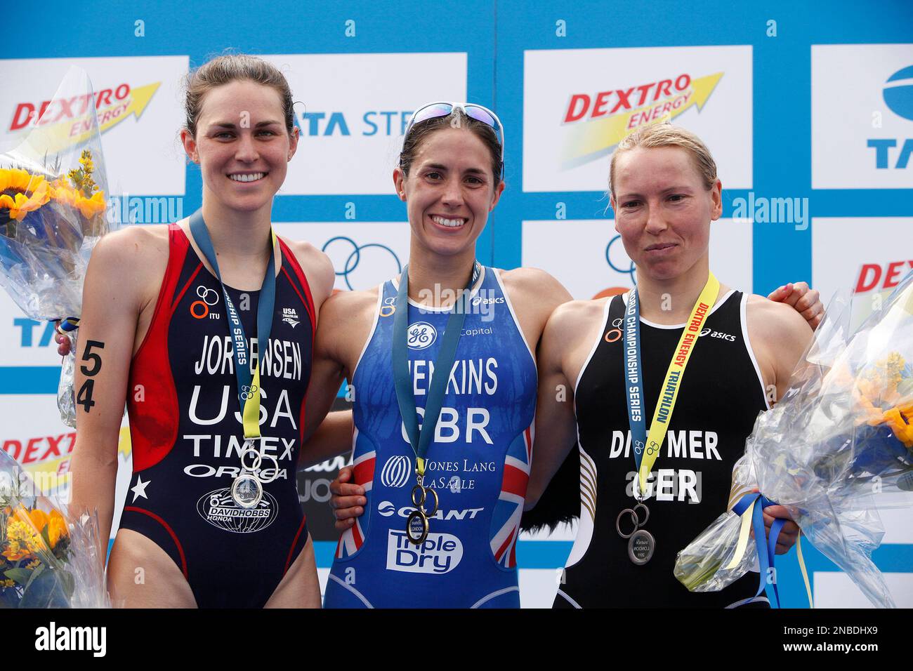 Helen Jenkins of Britain, centre, winner with Gwen Jorgensen of the U.S ...