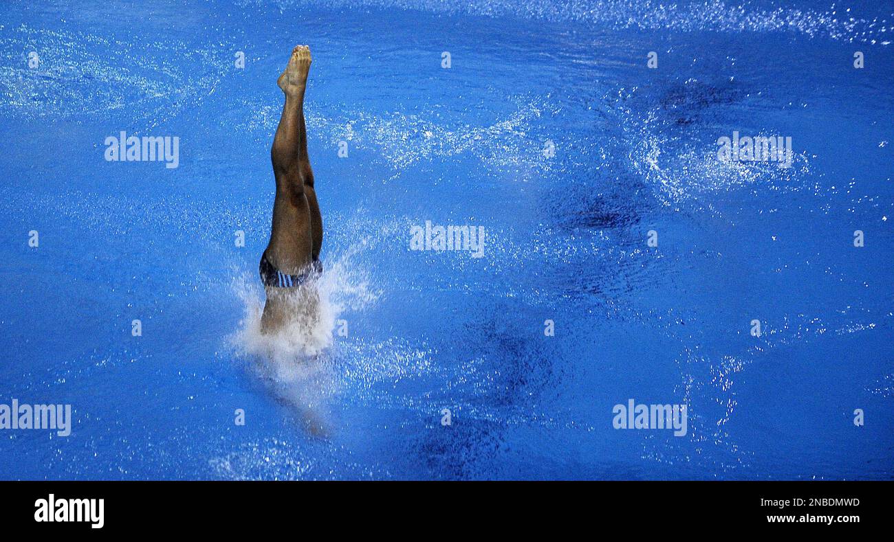 British Olympic diver Tom Daley performs a dive into the new aquatic ...