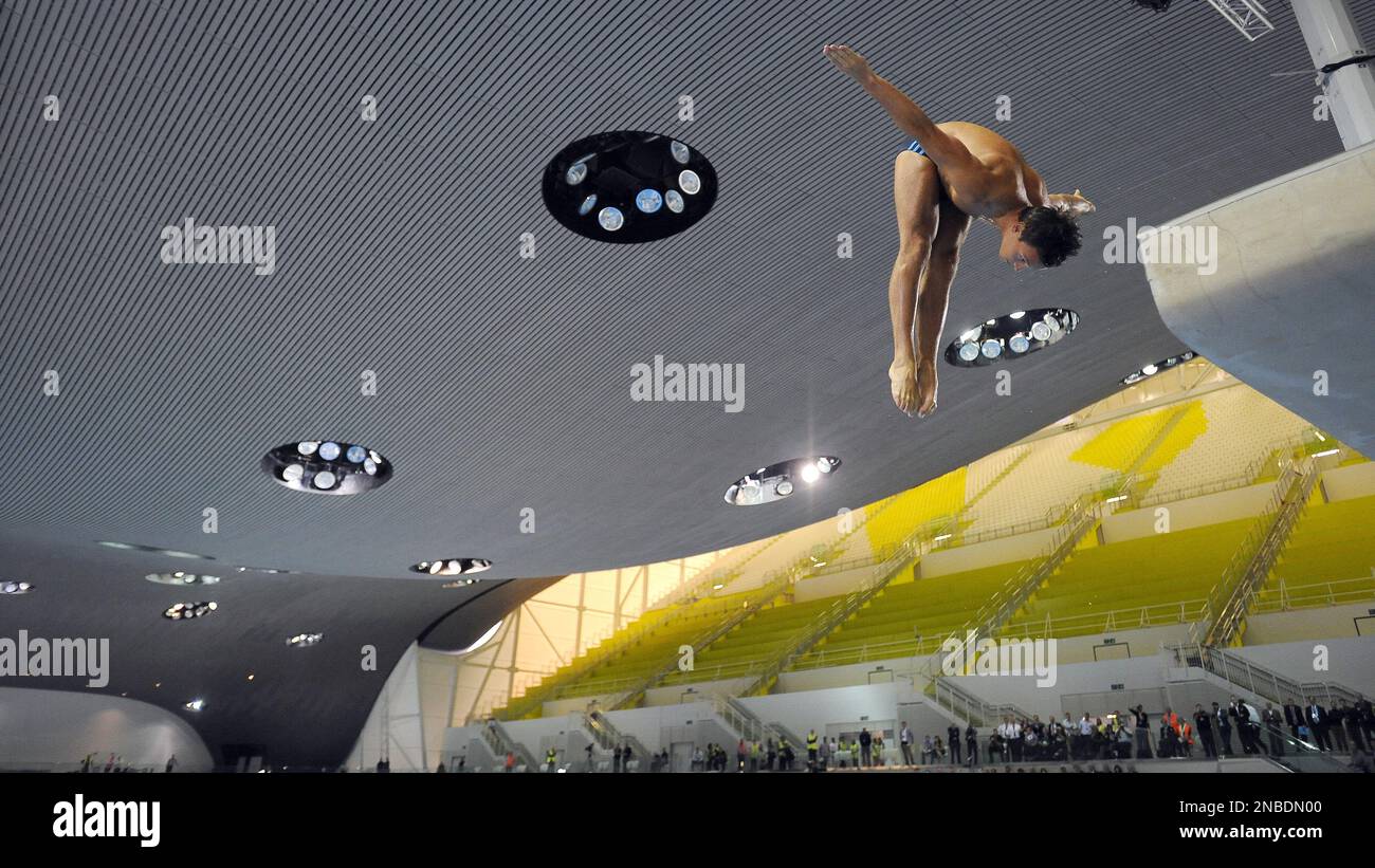 British Olympic diver Tom Daley performs a dive into the new aquatic ...