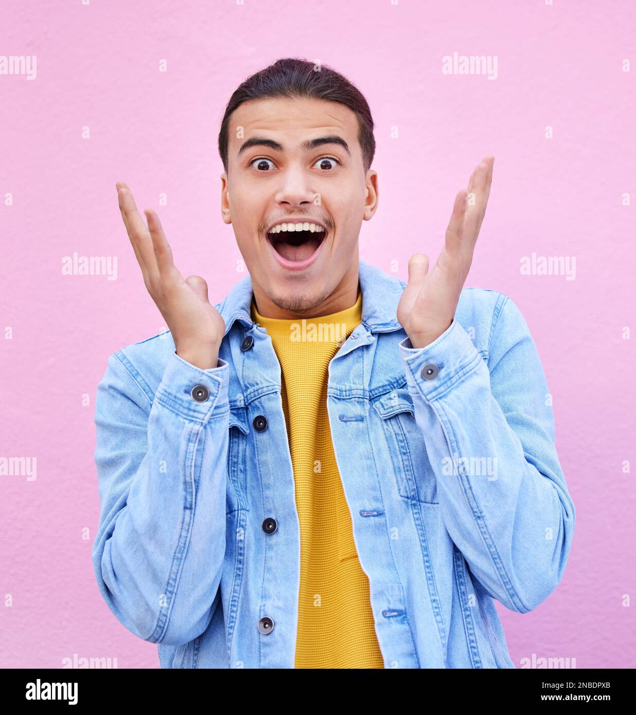 Man, hands and face for surprise in portrait with happiness, excited ...