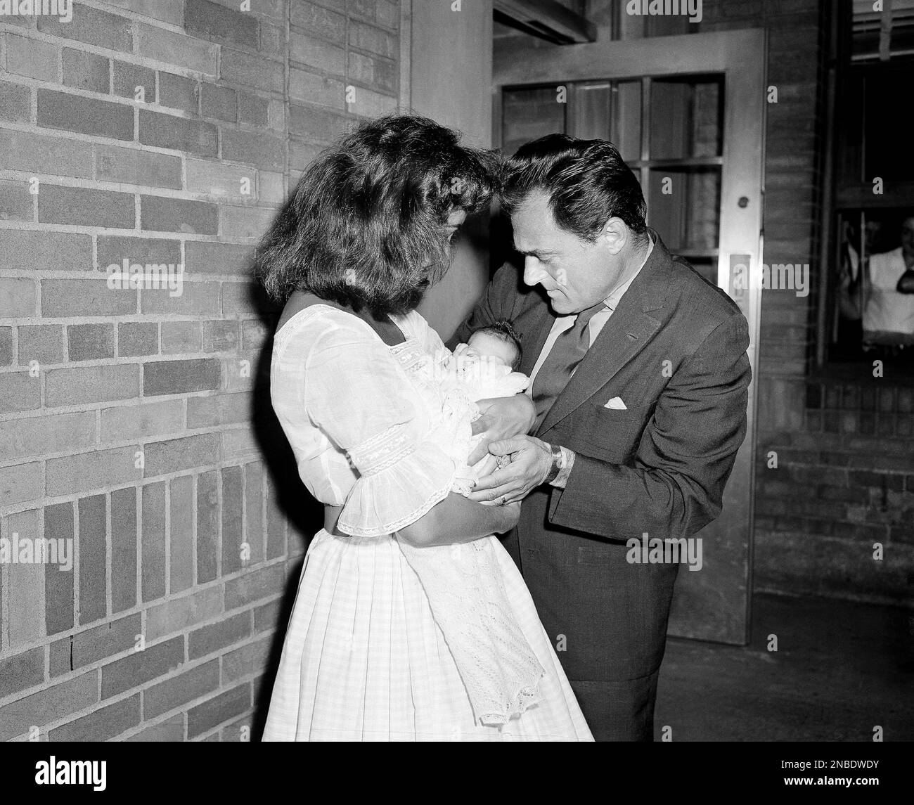 Mike Todd and his wife, actress Elizabeth Taylor, give all their ...