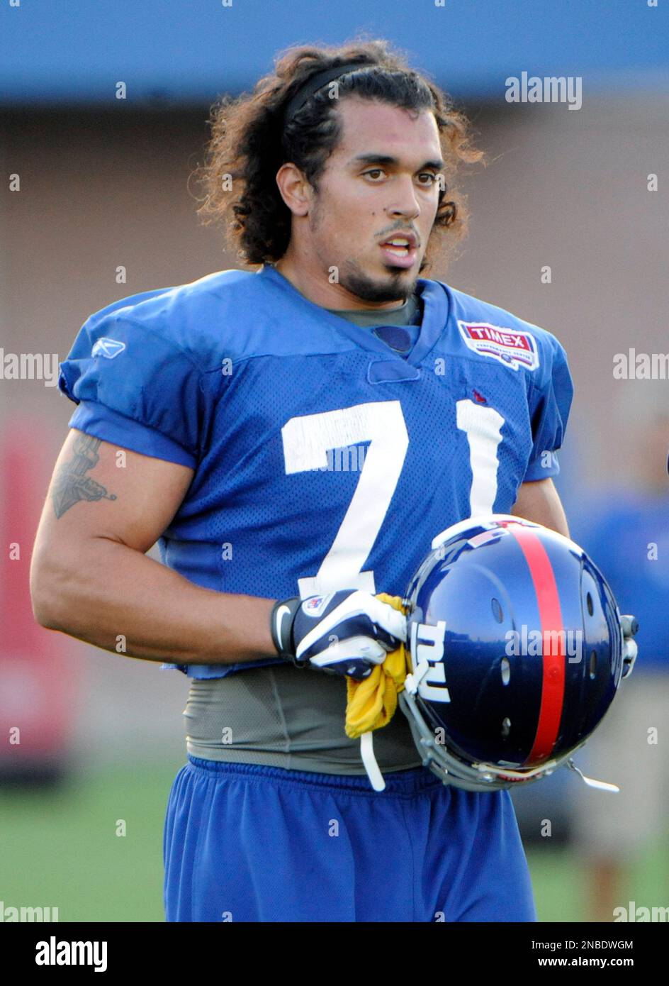 New York Giants defensive end Justin Trattou looks on during NFL ...