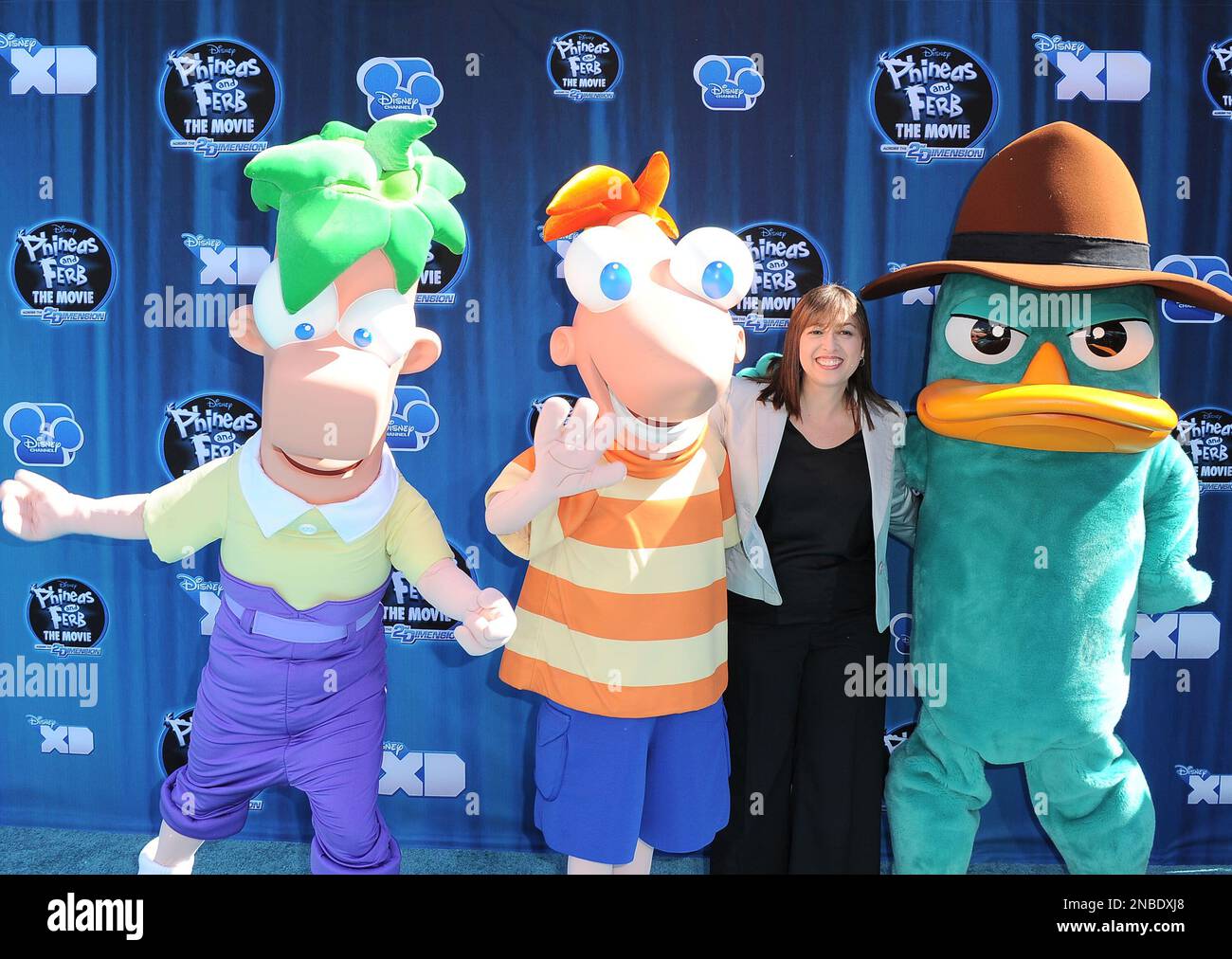 Carolina Whitecap poses with characters from the movie at the premiere ...