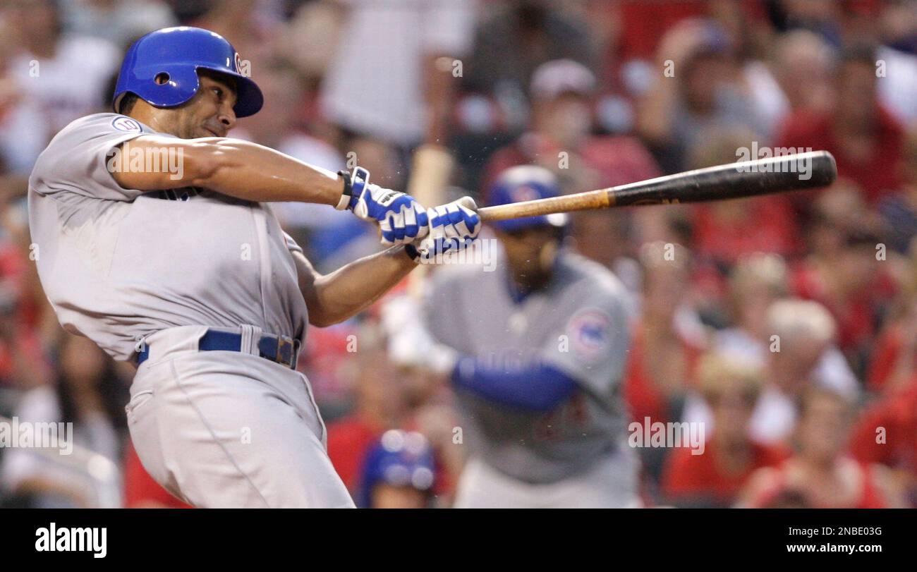 Chicago Cubs first baseman Carlos Pena bats in a baseball game against ...
