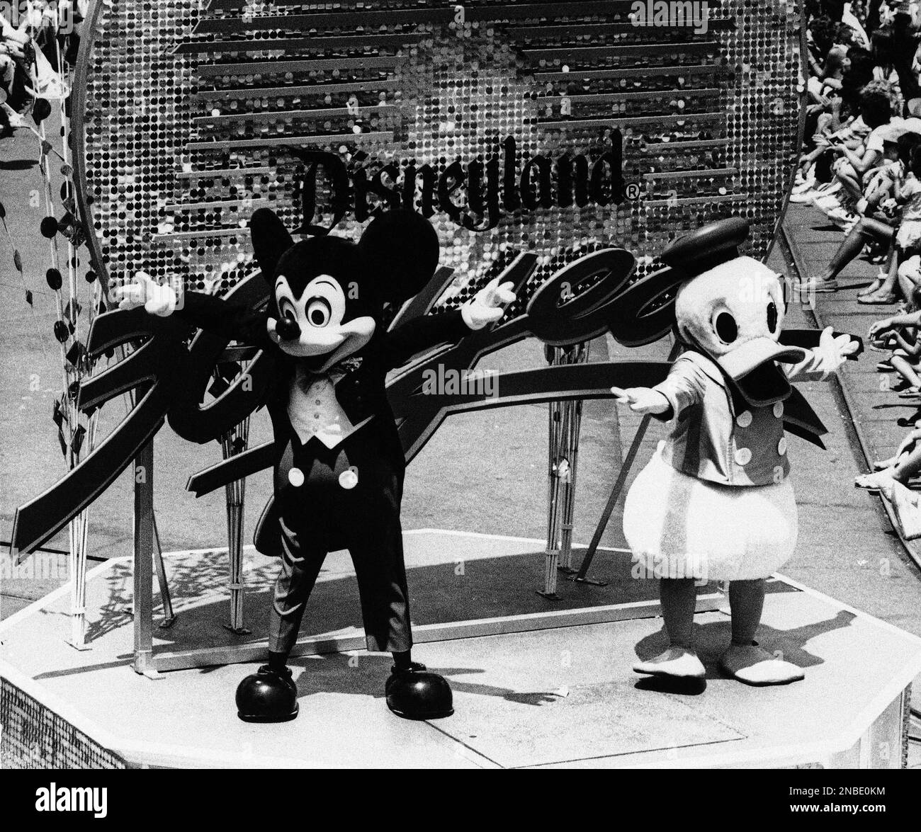 Mickey Mouse and Donald Duck ride a float together down Main Street in ...