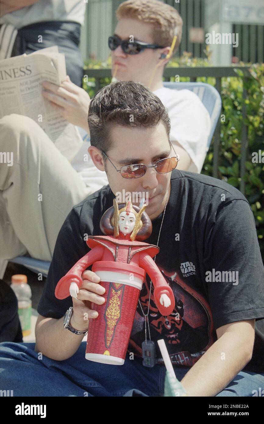 Kraig McLaughlin of Los Angeles sips from a “Queen Amidala” soft drink ...