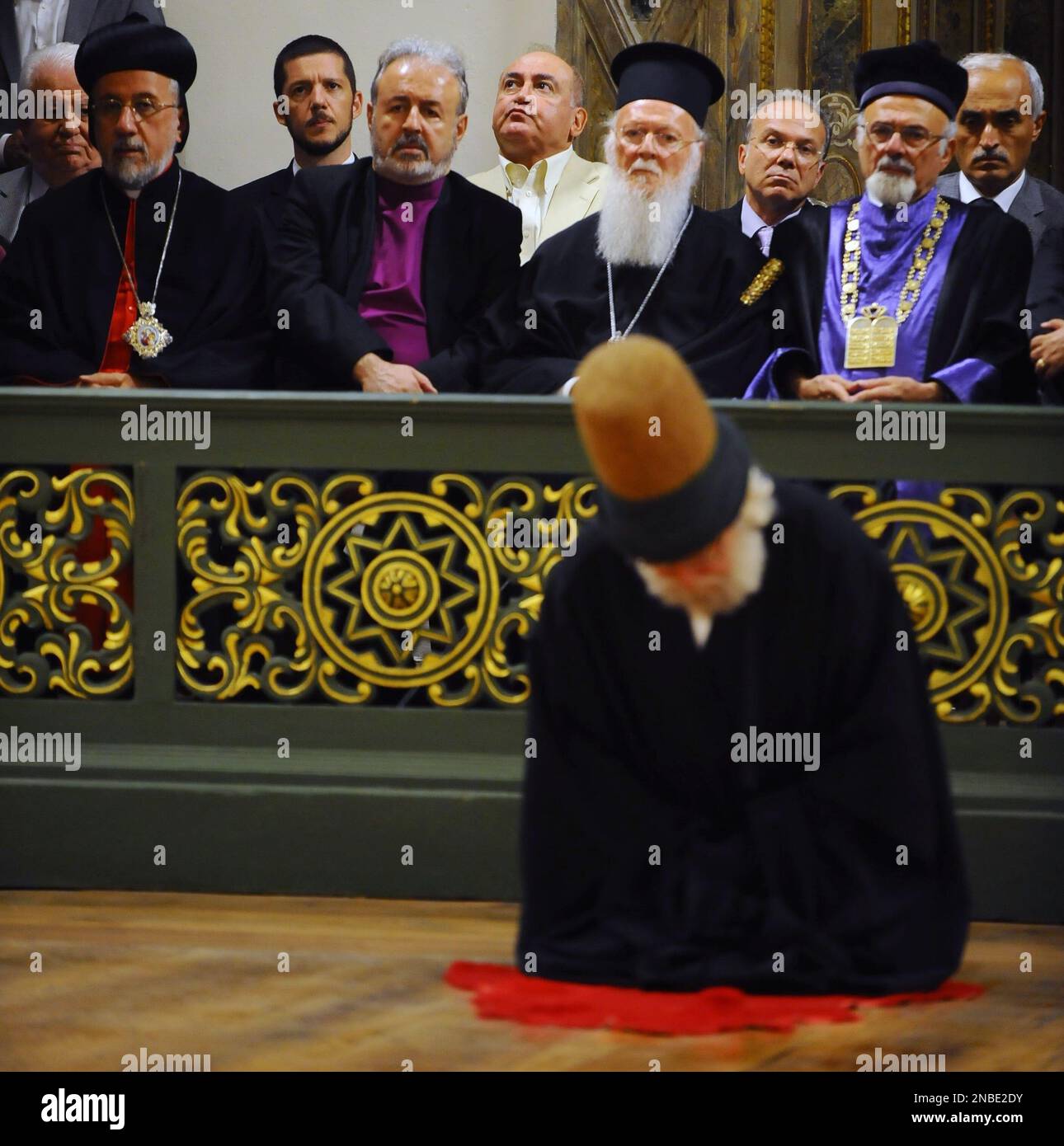 From left, the leader of Turkish Assyrian Christians Yusuf Cetin ...