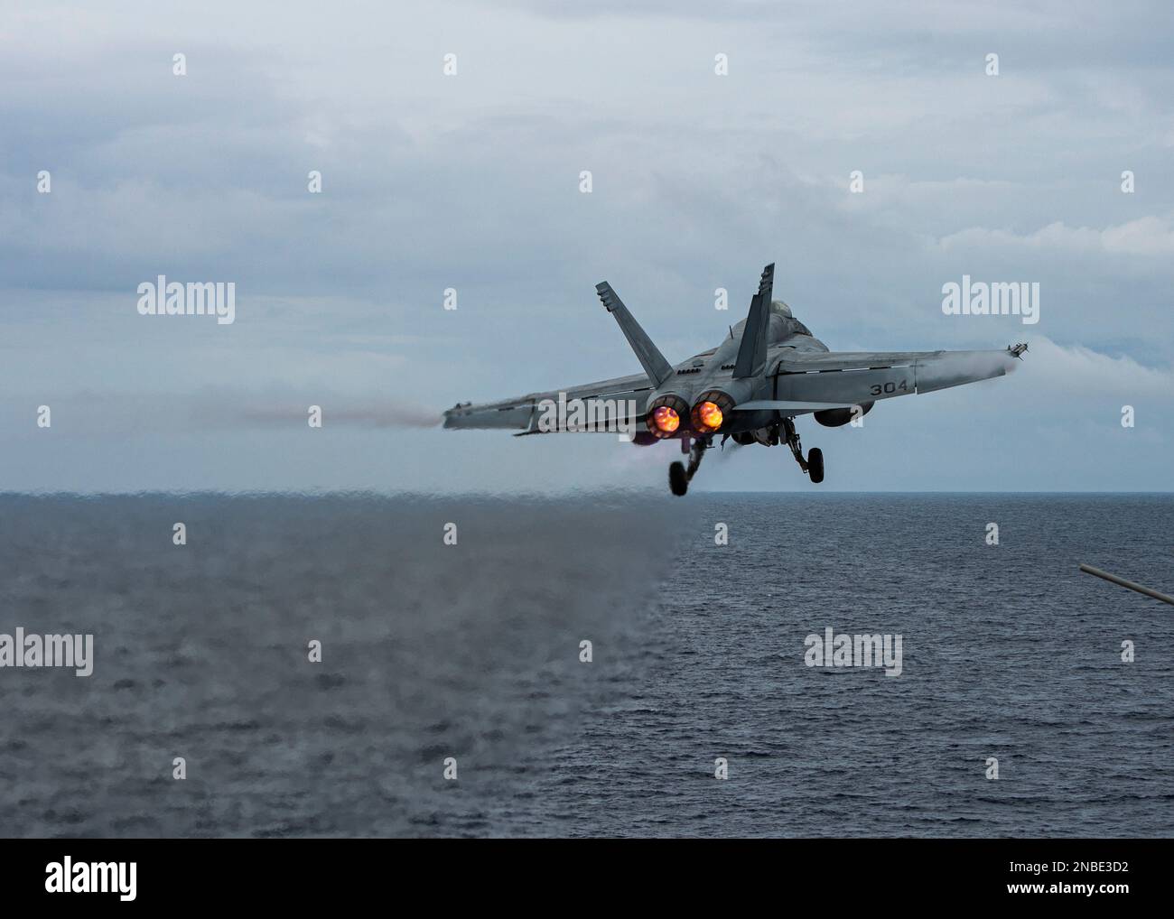 230212-N-MH015-1090 SOUTH CHINA SEA (Feb. 12, 2023) An F/A-18E Super Hornet from the “Kestrels ...