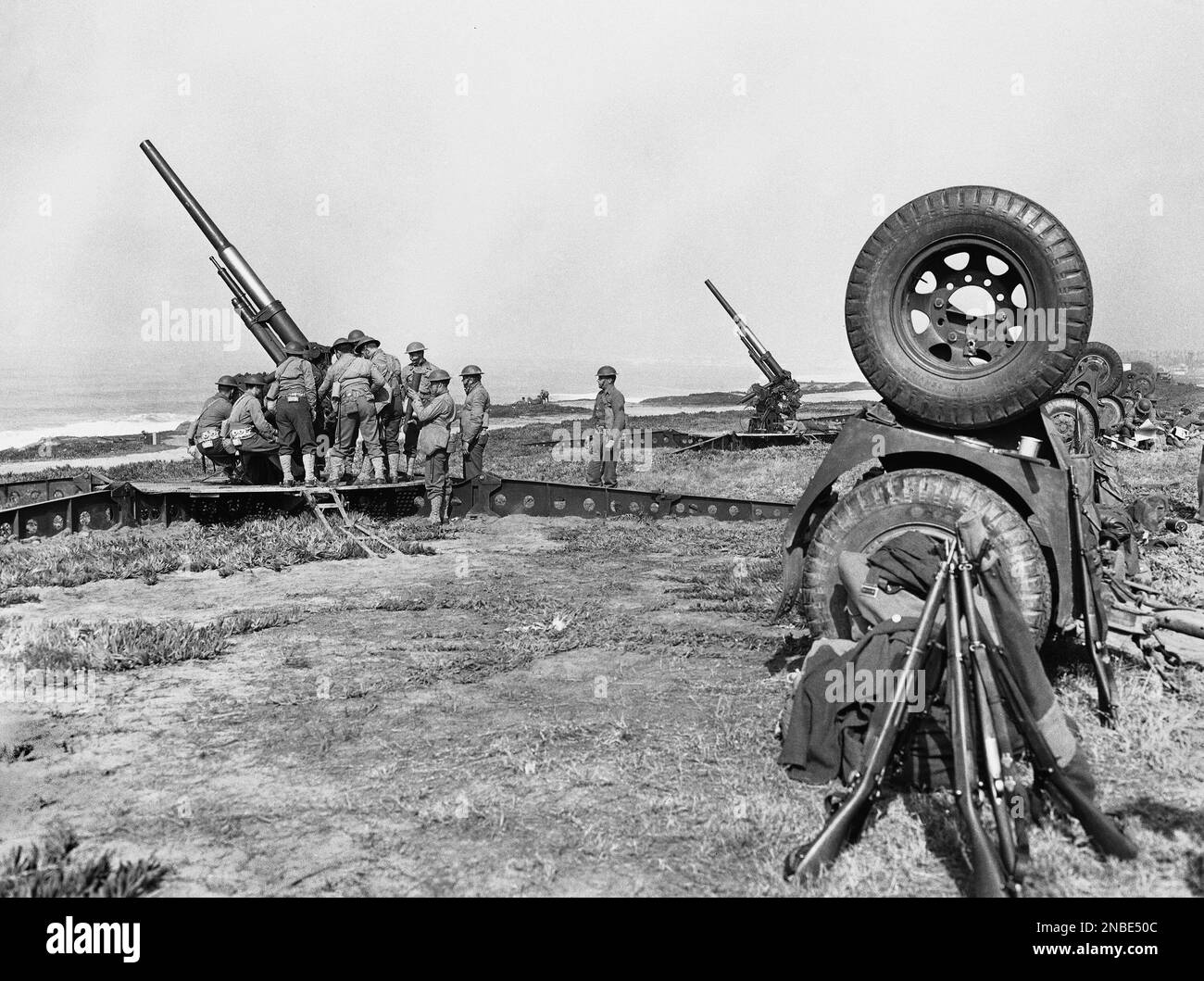 Anti-aircraft battery, composed of three-inch guns, in practice firing ...