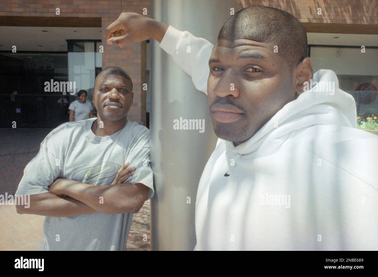 Chris Claiborne of USC and his father Emmitt Claiborne left pose for a ...