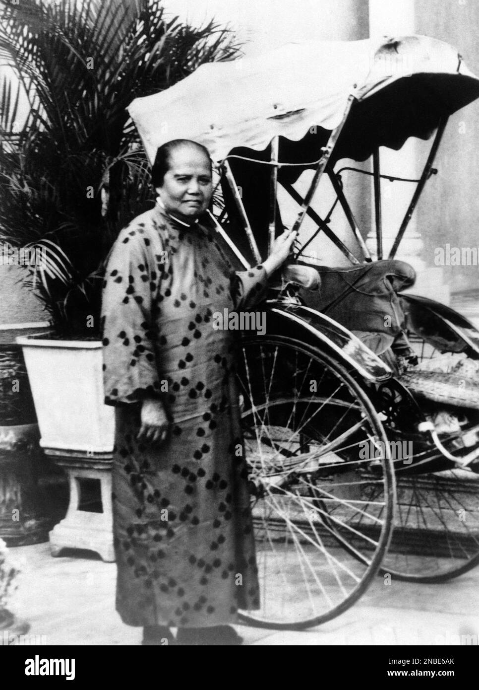 Lu Muzehn, the first wife of Dr. Sun Yat-sen, unseen, is shown beside ...