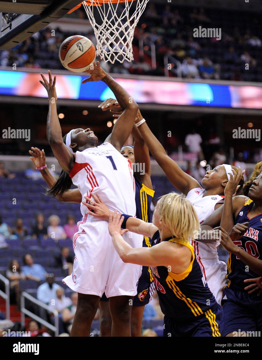Washington Mystics' Crystal Langhorne (1) goes to the basket against ...