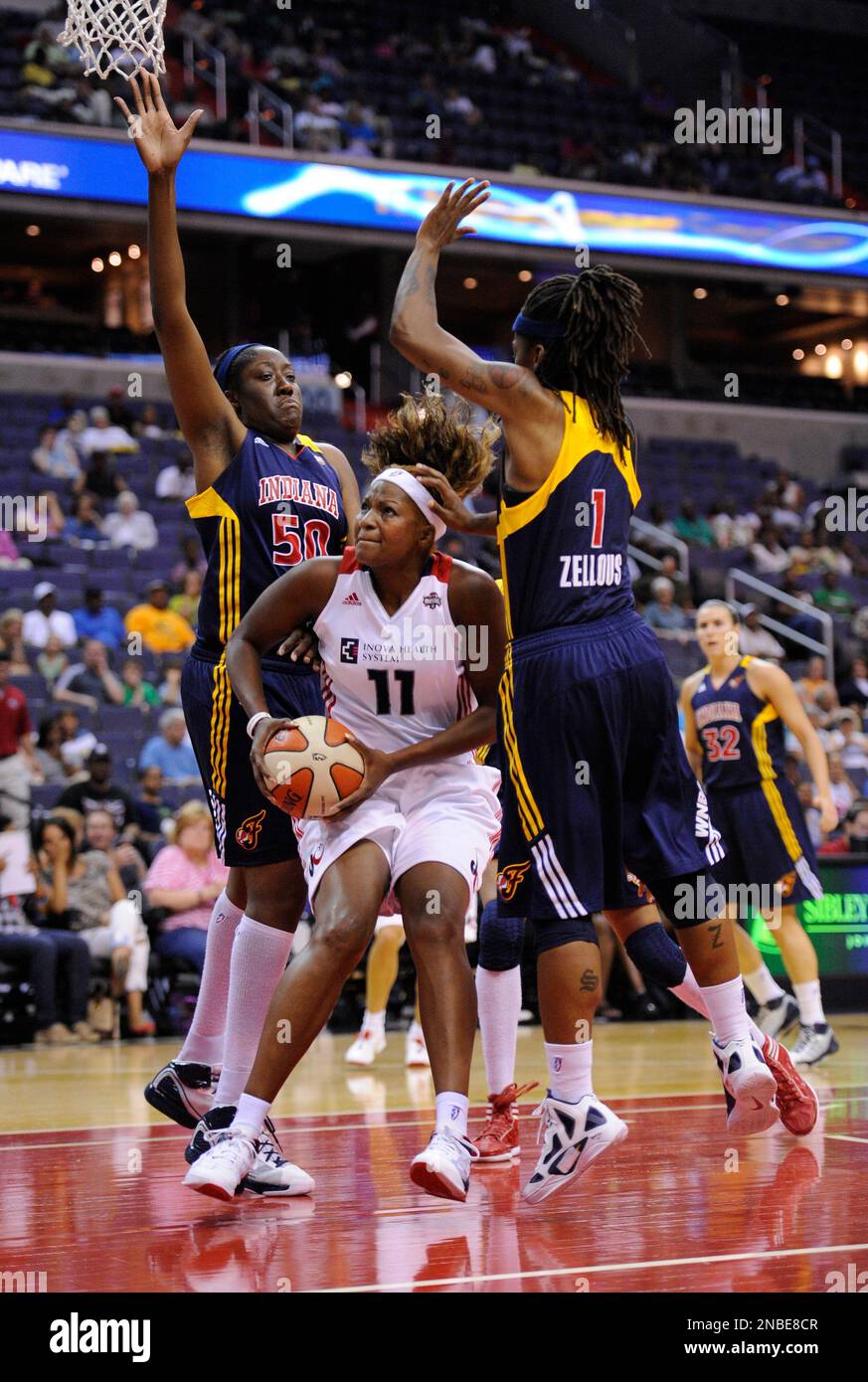 Washington Mystics' DeMya Walker (11) looks to the basket against ...