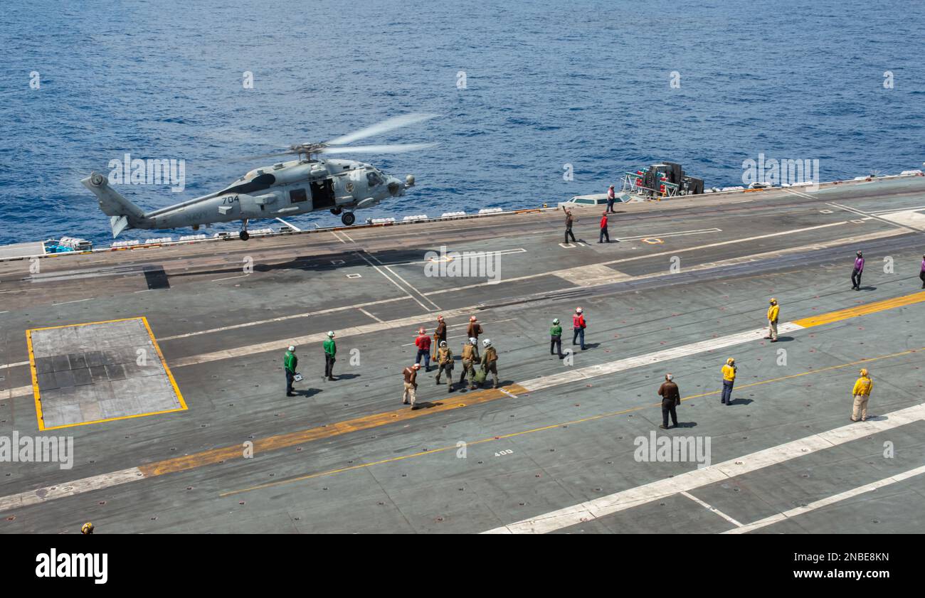 230211-N-WM182-2141 SOUTH CHINA SEA (Feb. 11, 2023) An MH-60R Sea Hawk ...