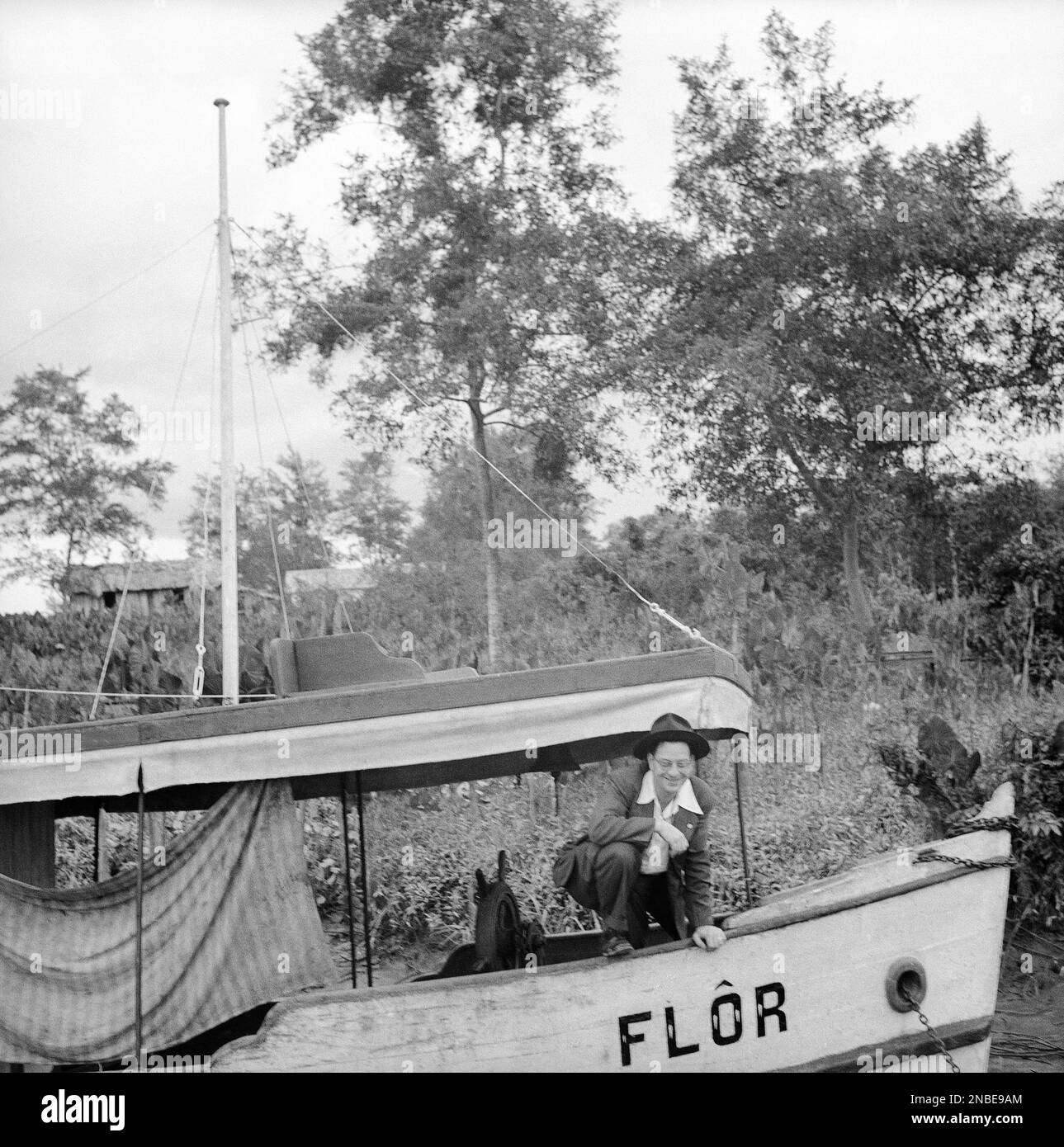 Ken Lucas, a Wide World Photo photographer, is shown on a typical ...