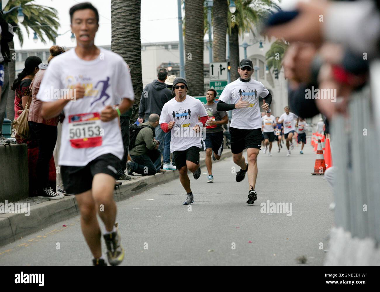 Apolo Ohno, second from left, a short track speed skating competitor ...