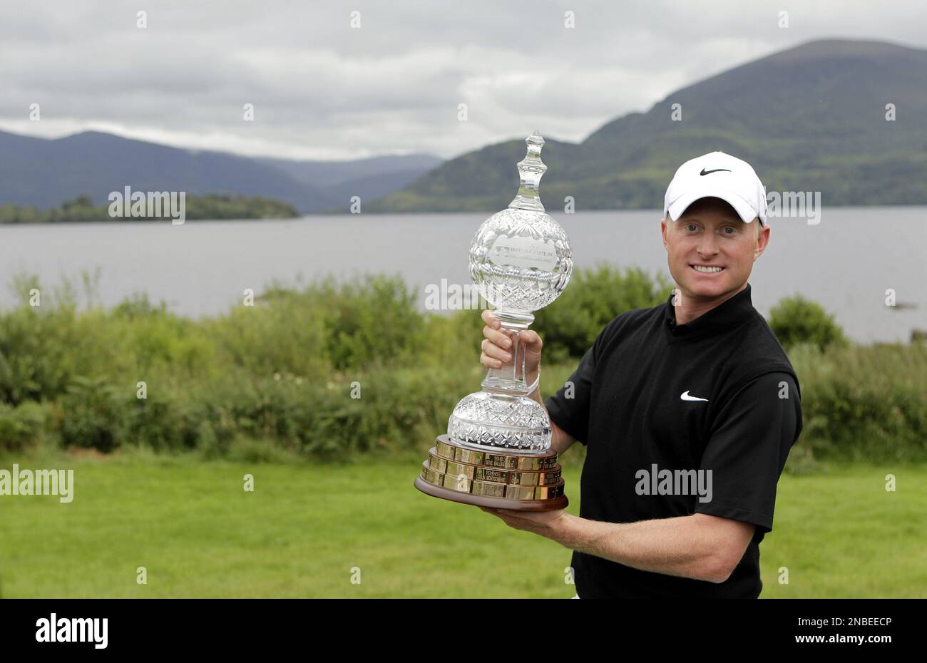 England's Simon Dyson holds the Irish Open Trophy after winning the ...