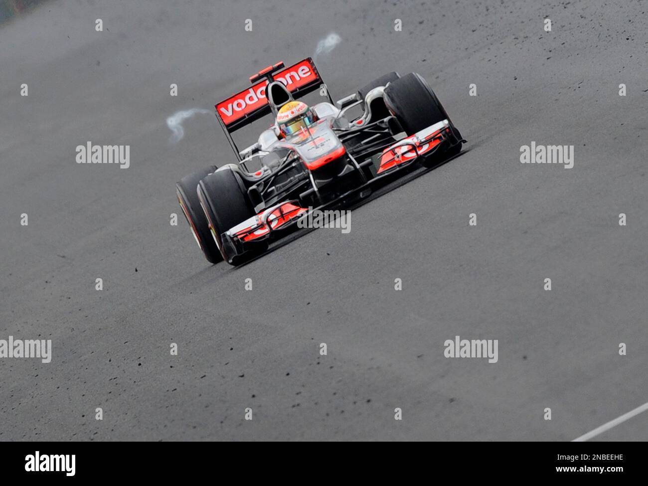 McLaren Mercedes driver Lewis Hamilton of Britain drives his race car ...