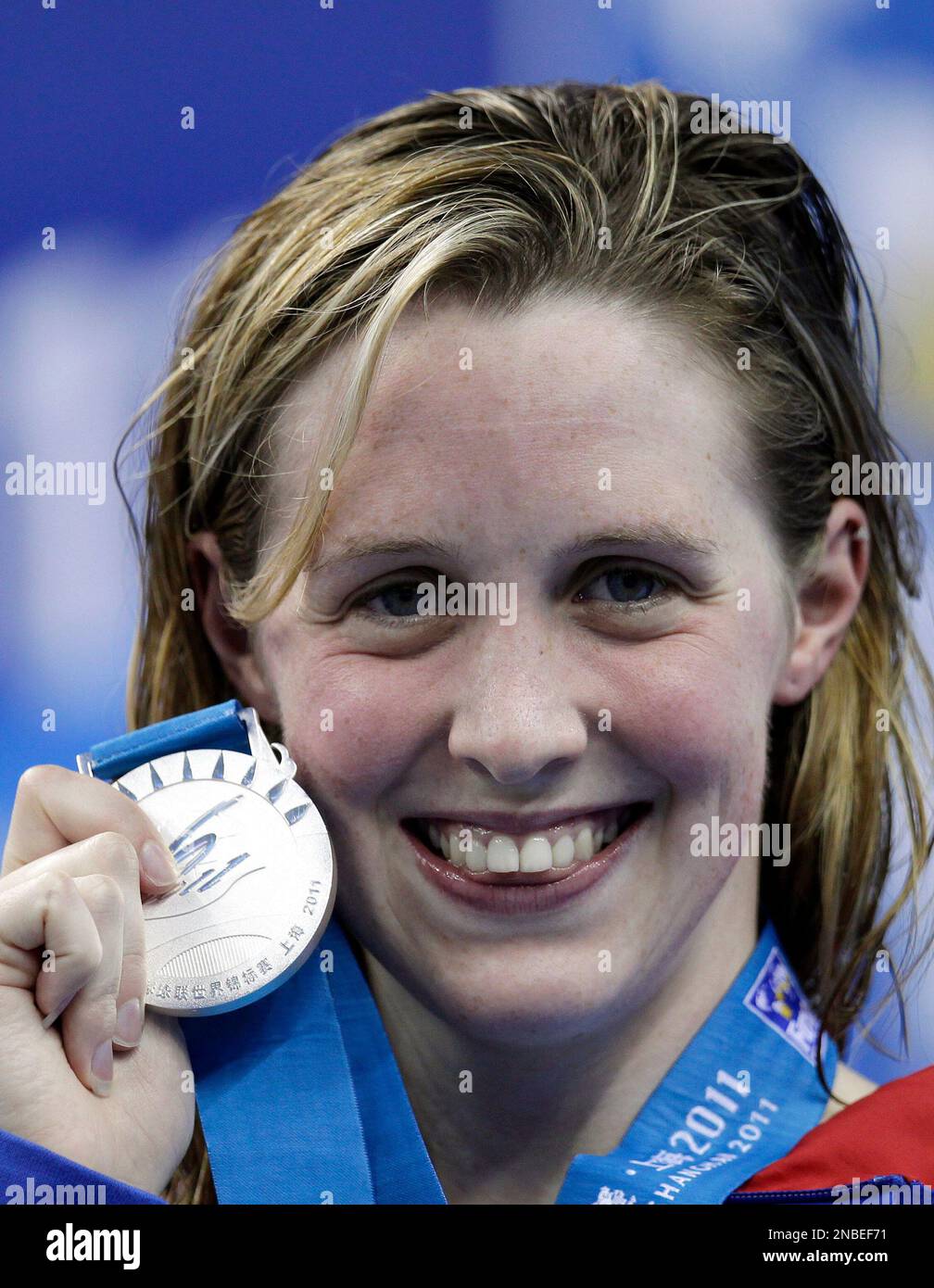 Britain's Hannah Miley shows the silver medal she won in the women's ...