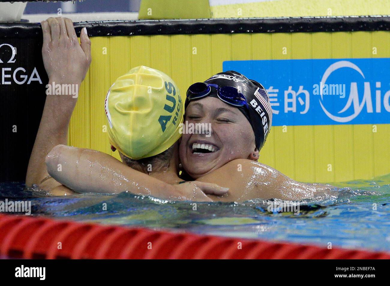 U.S. Elizabeth Beisel, right, embraces Australia's Stephanie Rice after ...