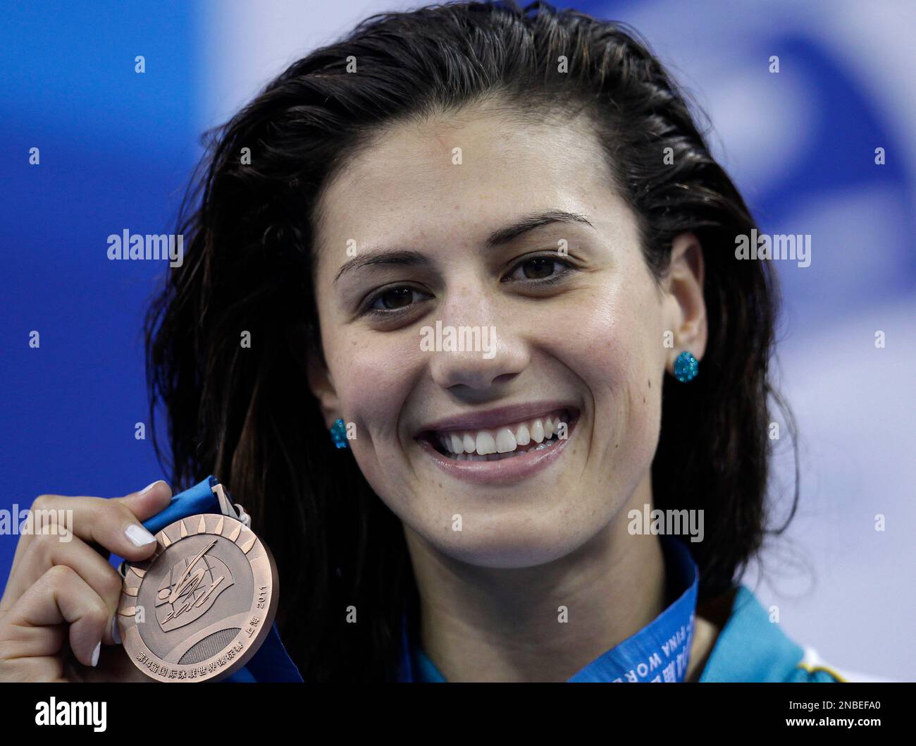 Australia's Stephanie Rice shows the bronze medal she won in the women ...