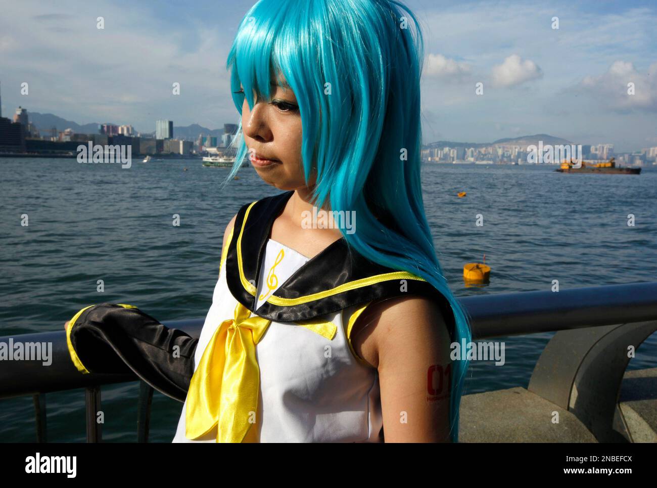 A "cosplayer" dressed as an animation character poses during the annual ...