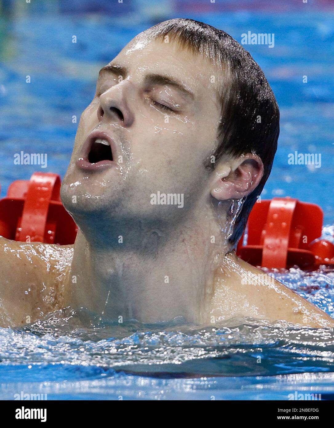 Britain's Liam Tancock breathes deeply after winning the men's 50m ...