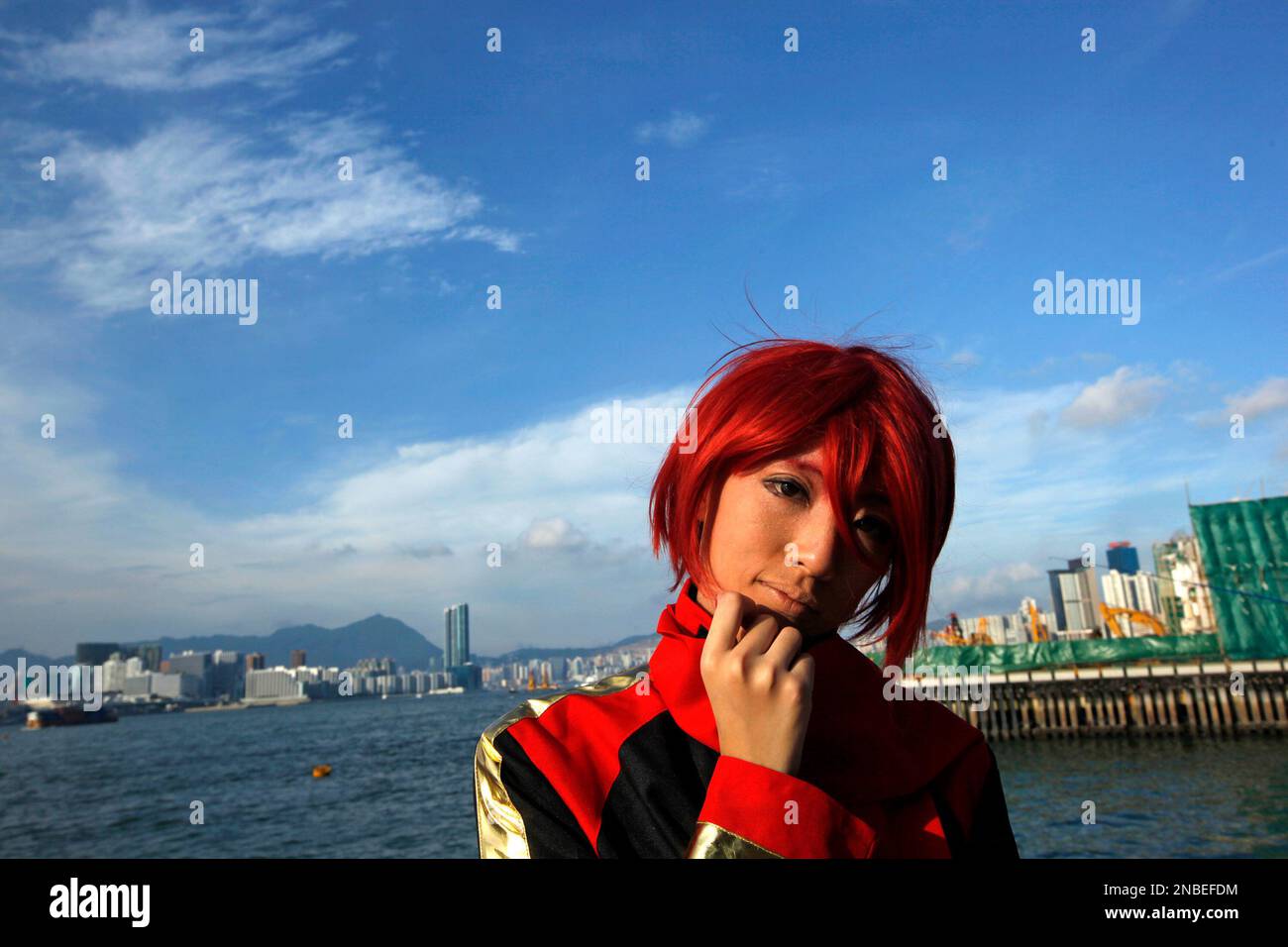 A "cosplayer" dressed as an animation character poses during the annual ...