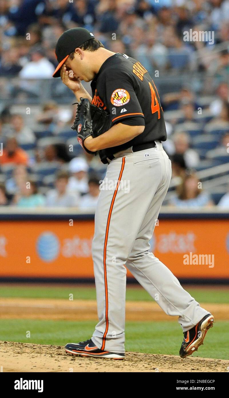Baltimore Orioles relief pitcher Jason Berken reacts after New York ...