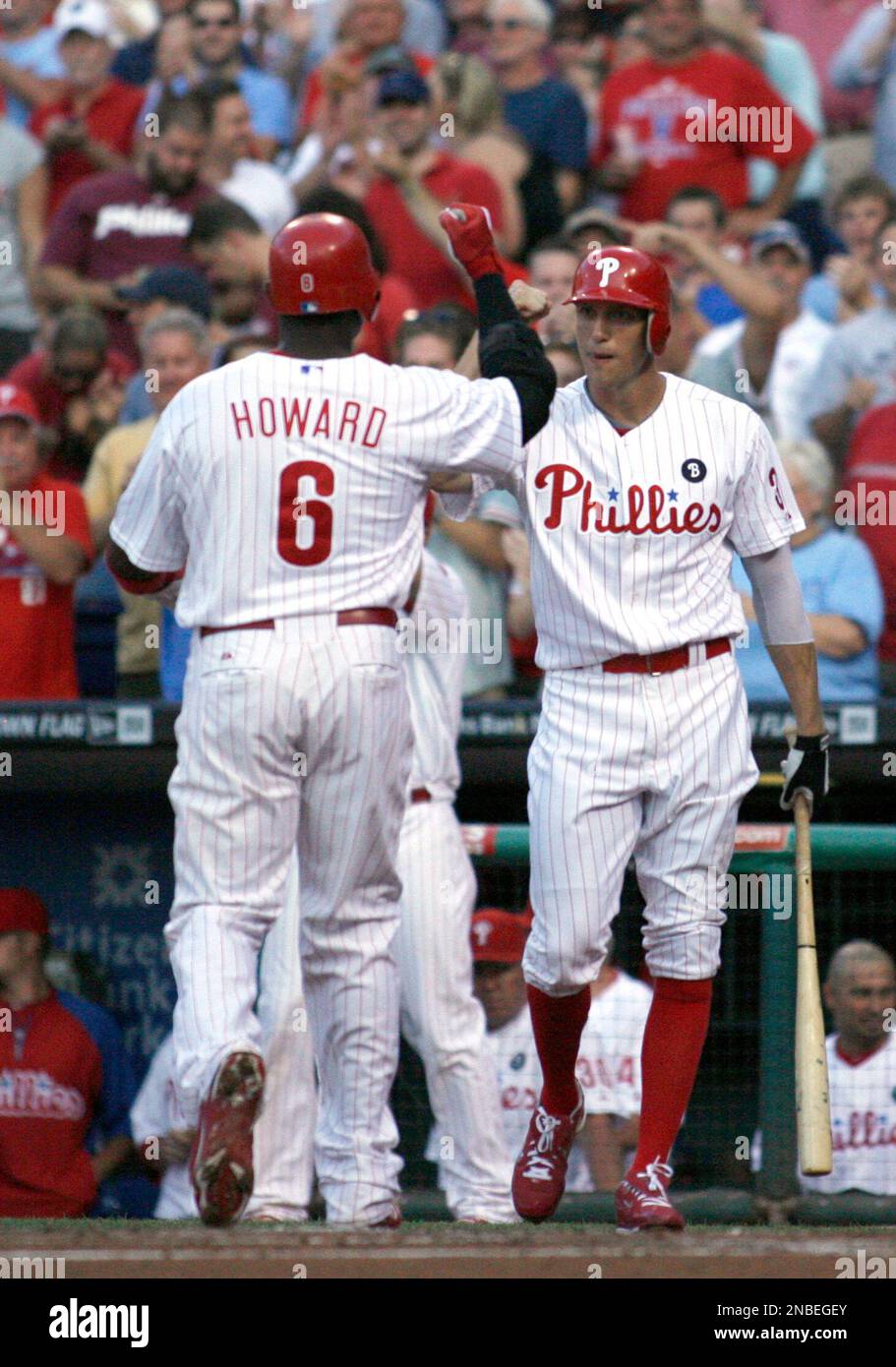 Philadelphia Phillies' Ryan Howard (6) celebrates with Hunter Pence ...