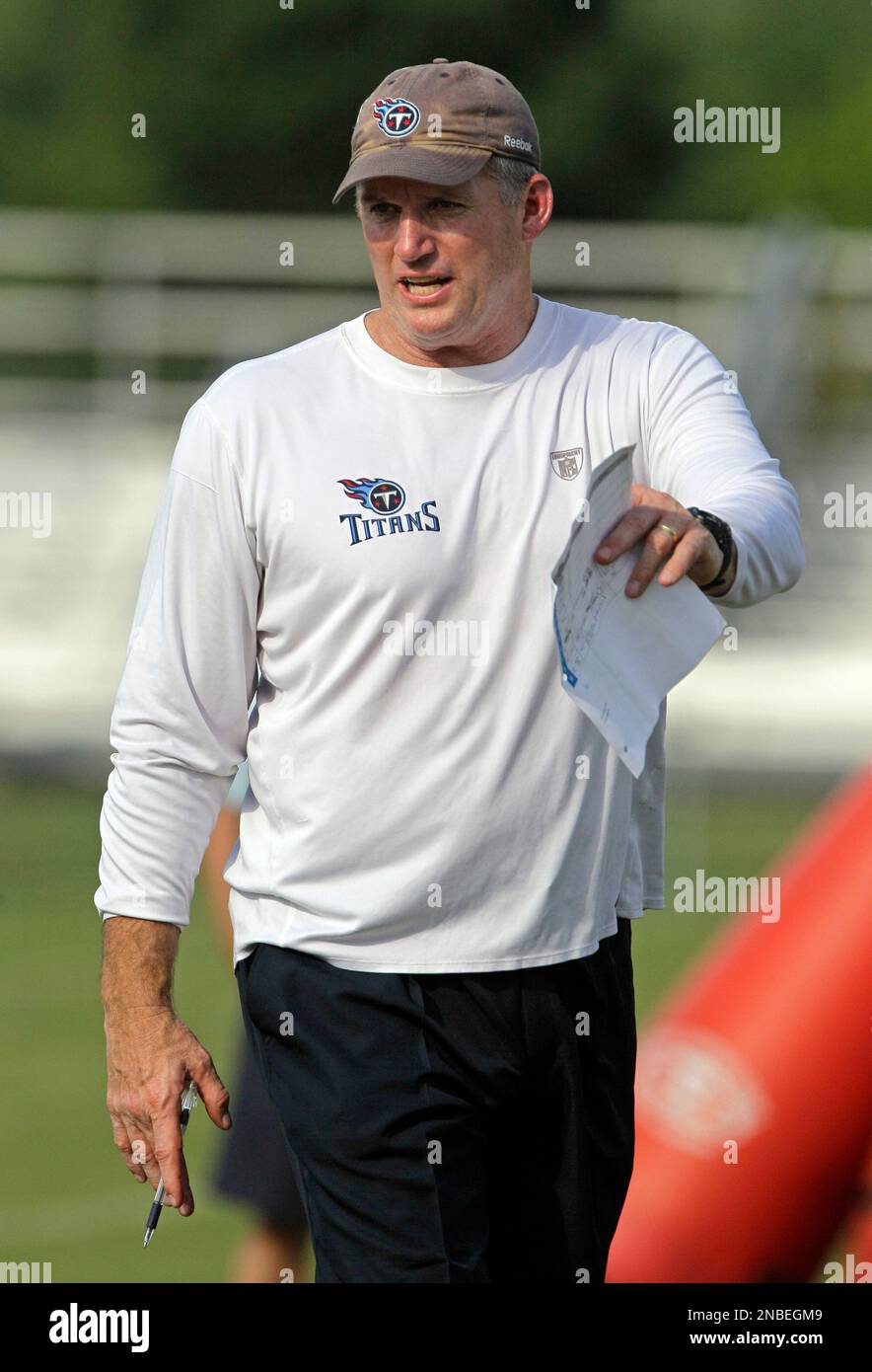 Tennessee Titans first-year head coach Mike Munchak directs the first ...