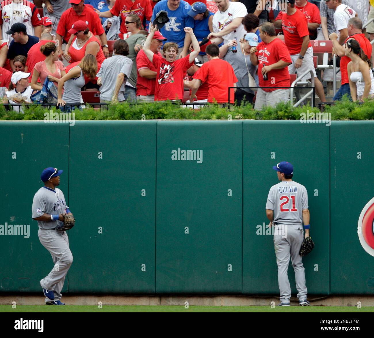 Chicago Cubs right fielder Tyler Colvin (21) and Marlon Byrd (24) watch ...
