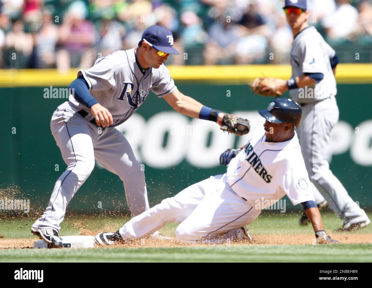 Tampa Bay Rays' Sean Rodriguez, left, is late tagging Seattle Mariners ...
