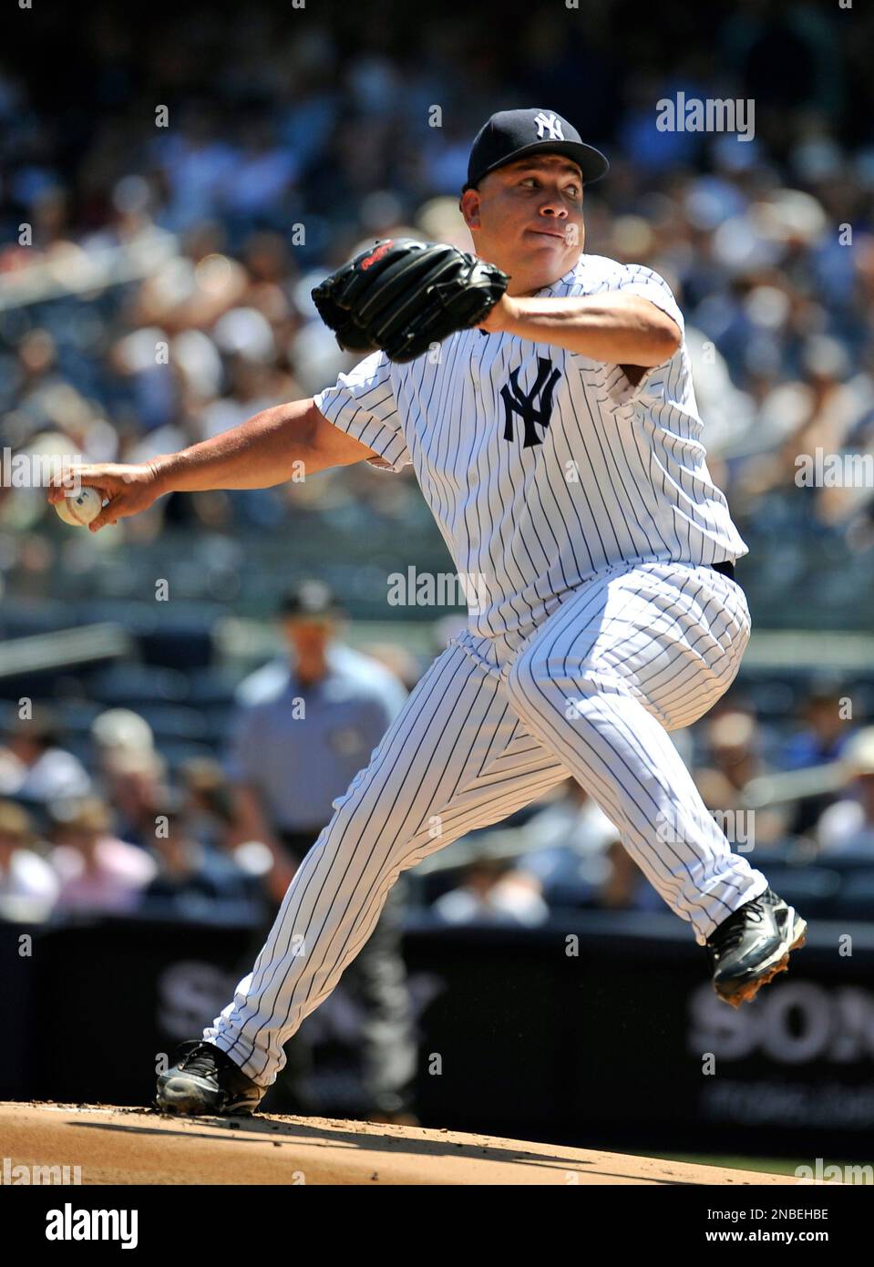 New York Yankees starting pitcher Bartolo Colon throws against the ...