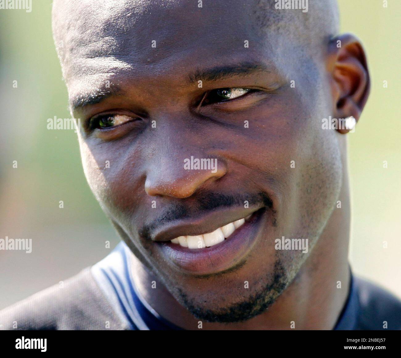 New England Patriots receiver Chad Ochocinco looks on during NFL ...