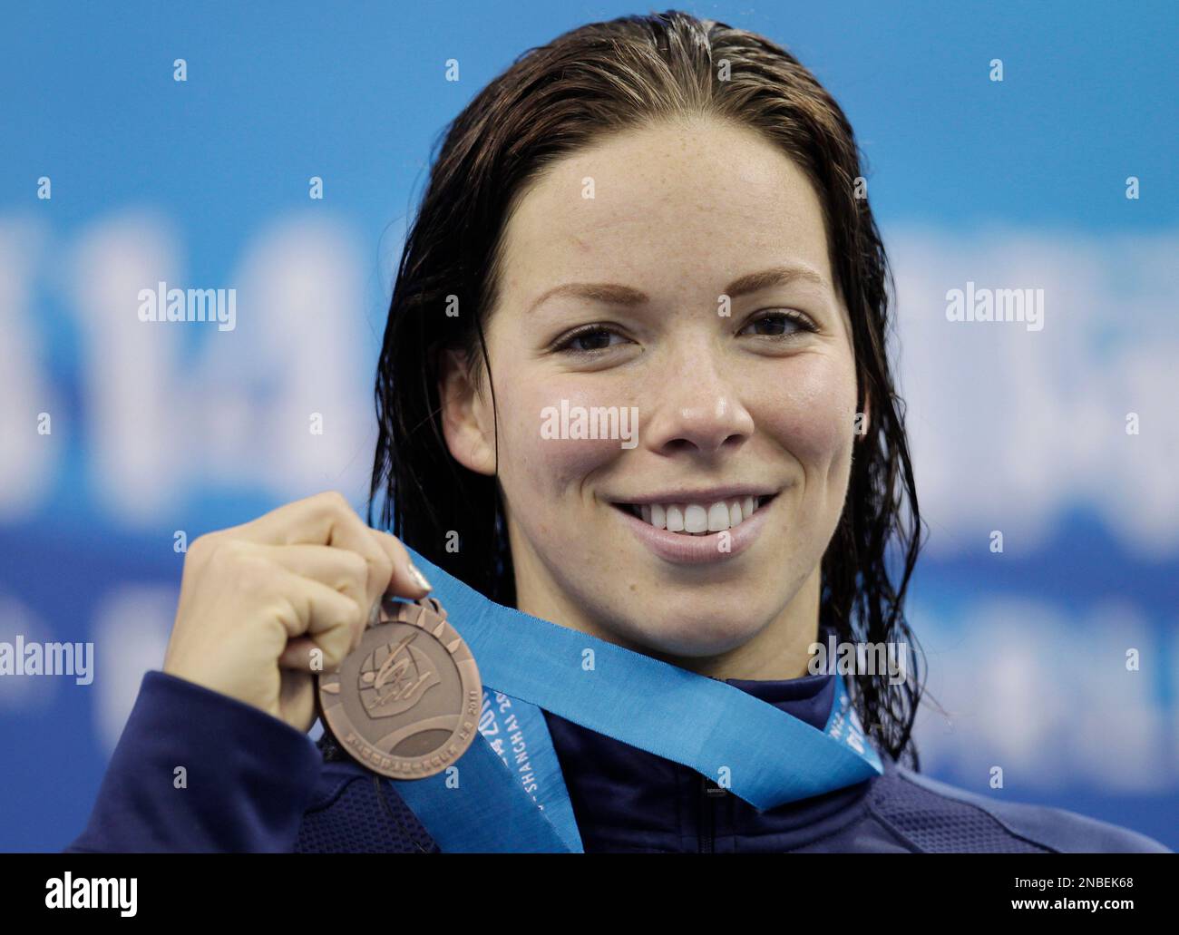 U.S. Kate Ziegler shows the bronze medal she won in the women's 800m ...
