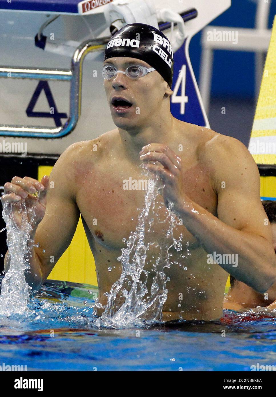 Brazil's Cesar Cielo looks at the scoreboard after winning the gold ...