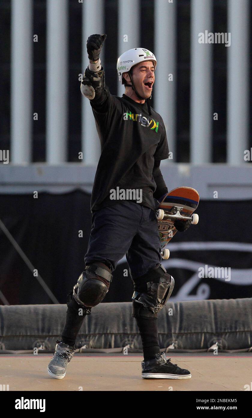 Bob Burnquist, of Brazil, celebrates after finishing his run in the ...