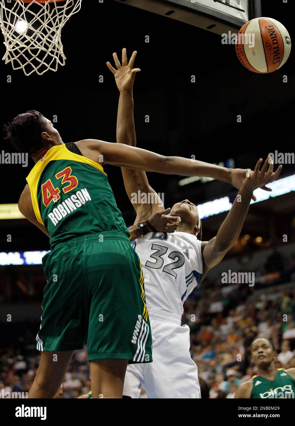 Seattle Storm center Ashley Robinson blocks the shot of Minnesota Lynx ...