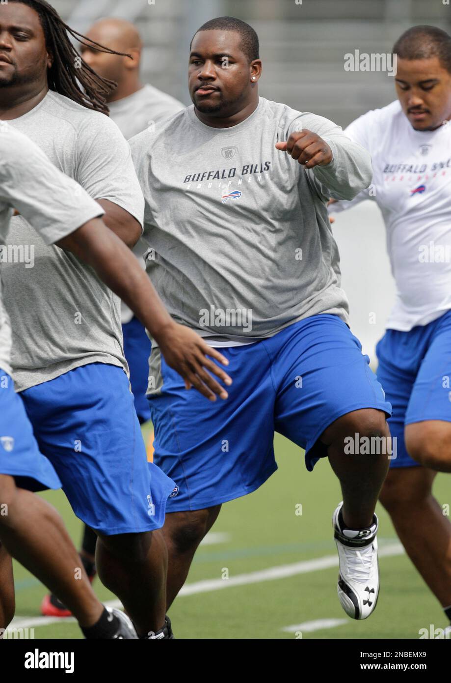 Buffalo Bills' Marcell Dareus, center, runs a drill during the NFL ...