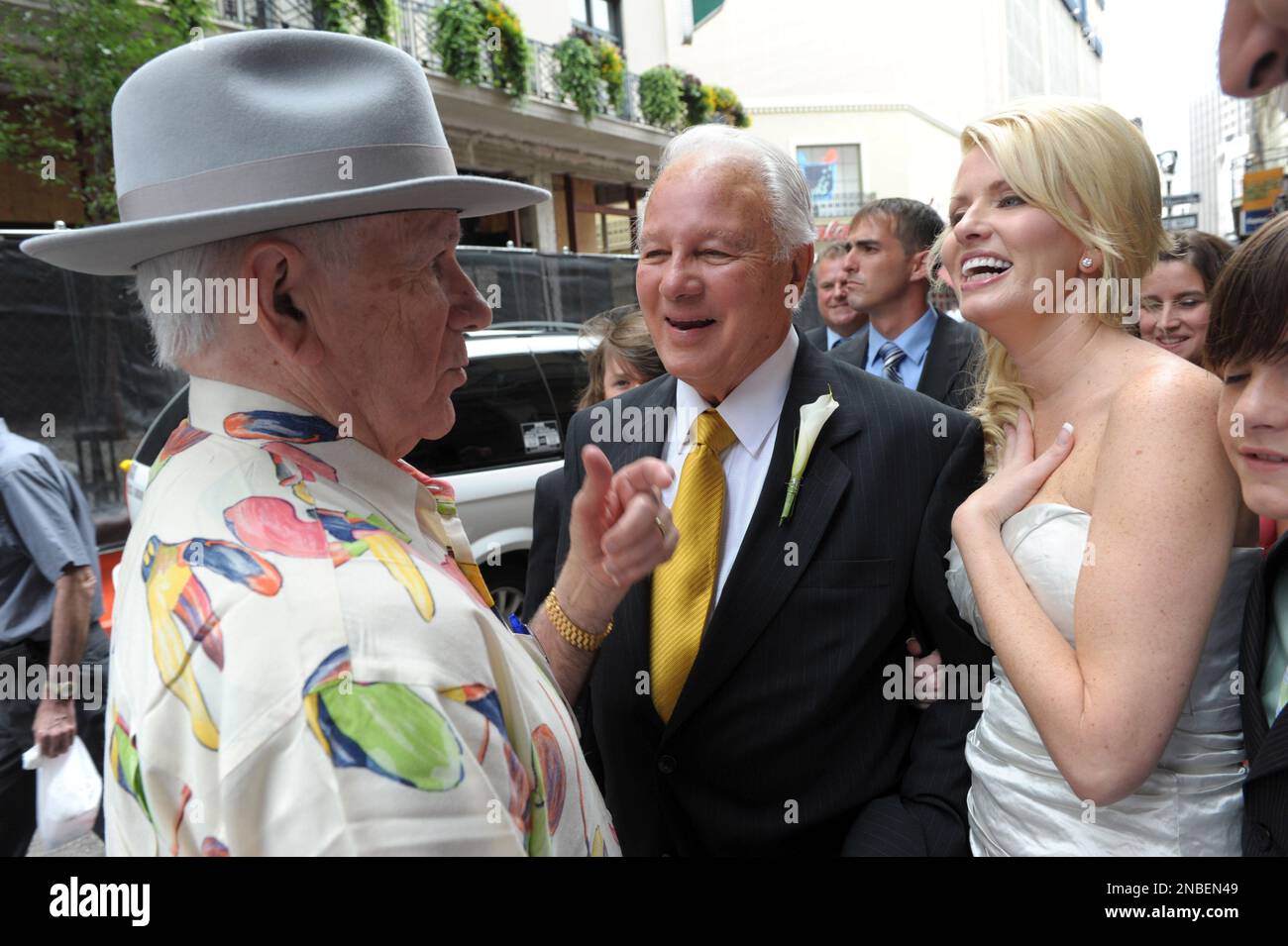 Marion Edwards greets his brother Governor Edwin Edwards and his new bride, Trina Grimes Scott ...