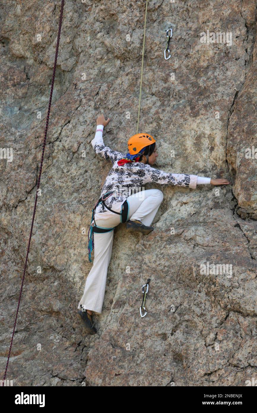 Female Iranian climber, Targol Anvarinejad, climbs up Maryam rock, at ...